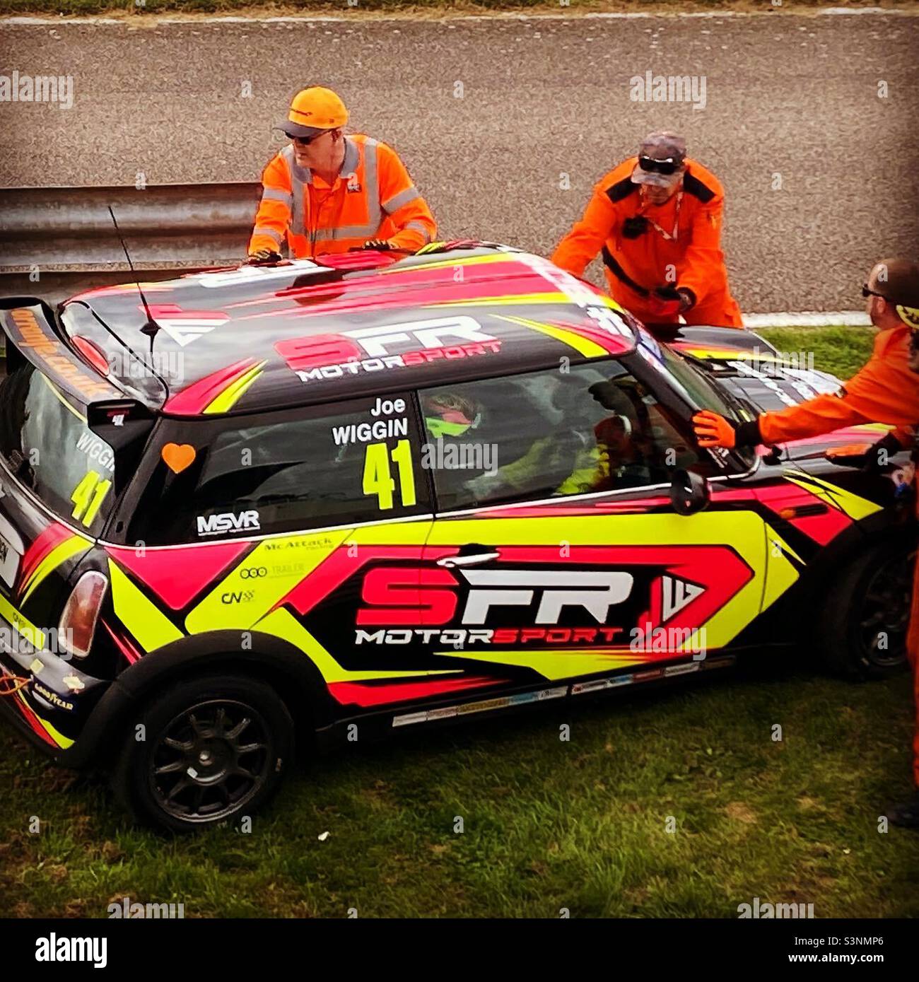 Broken down touring car mini Stock Photo - Alamy