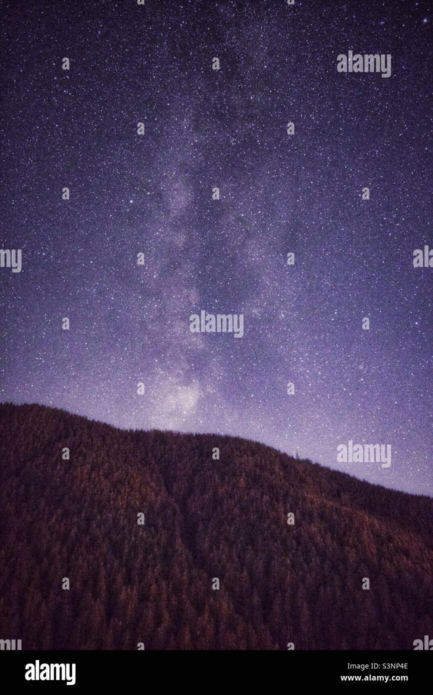 Milky way over the hill in South Tyrol, Italy Stock Photo - Alamy