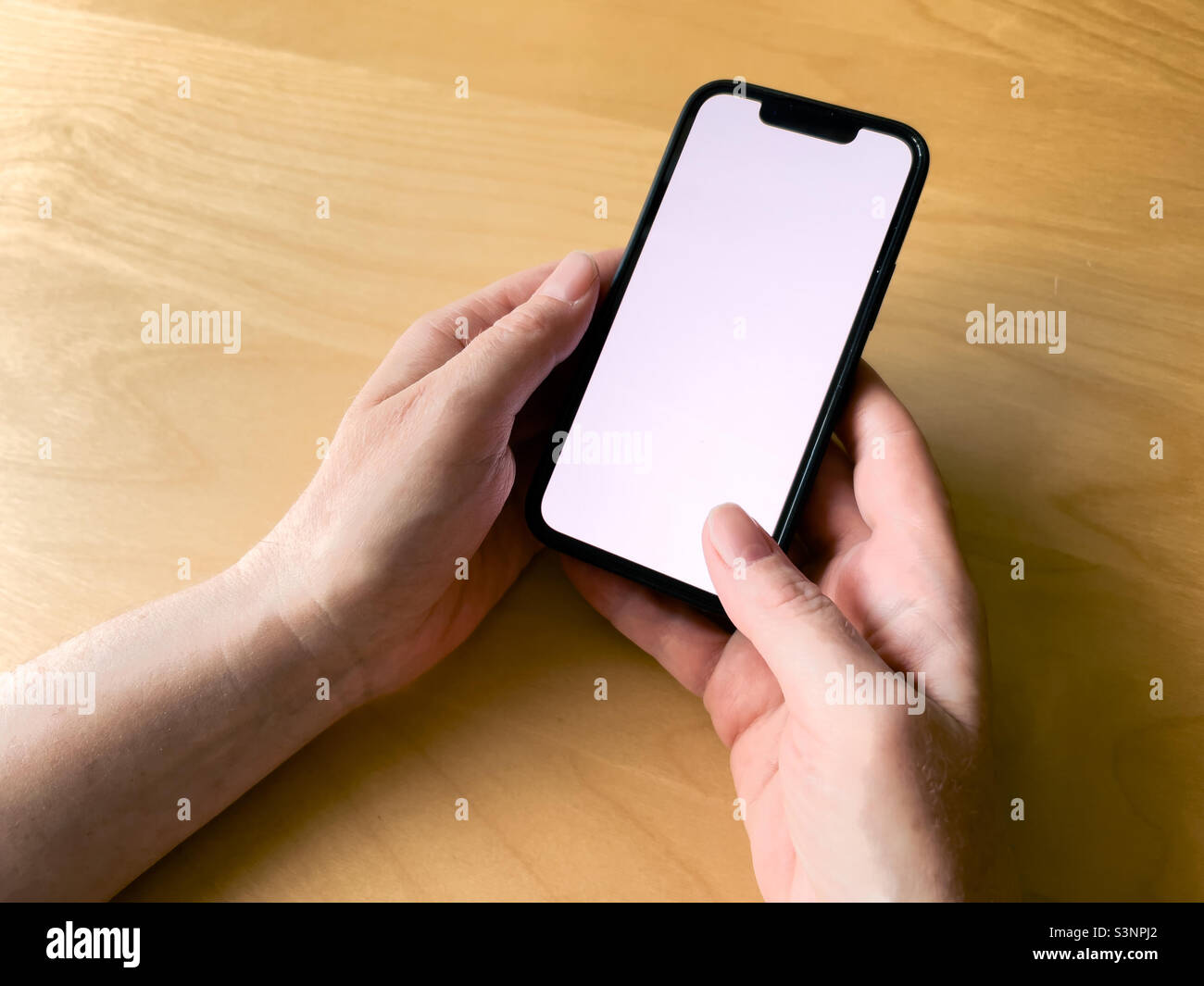Smartphone female hand holding smartphone stock photos and images - Alamy