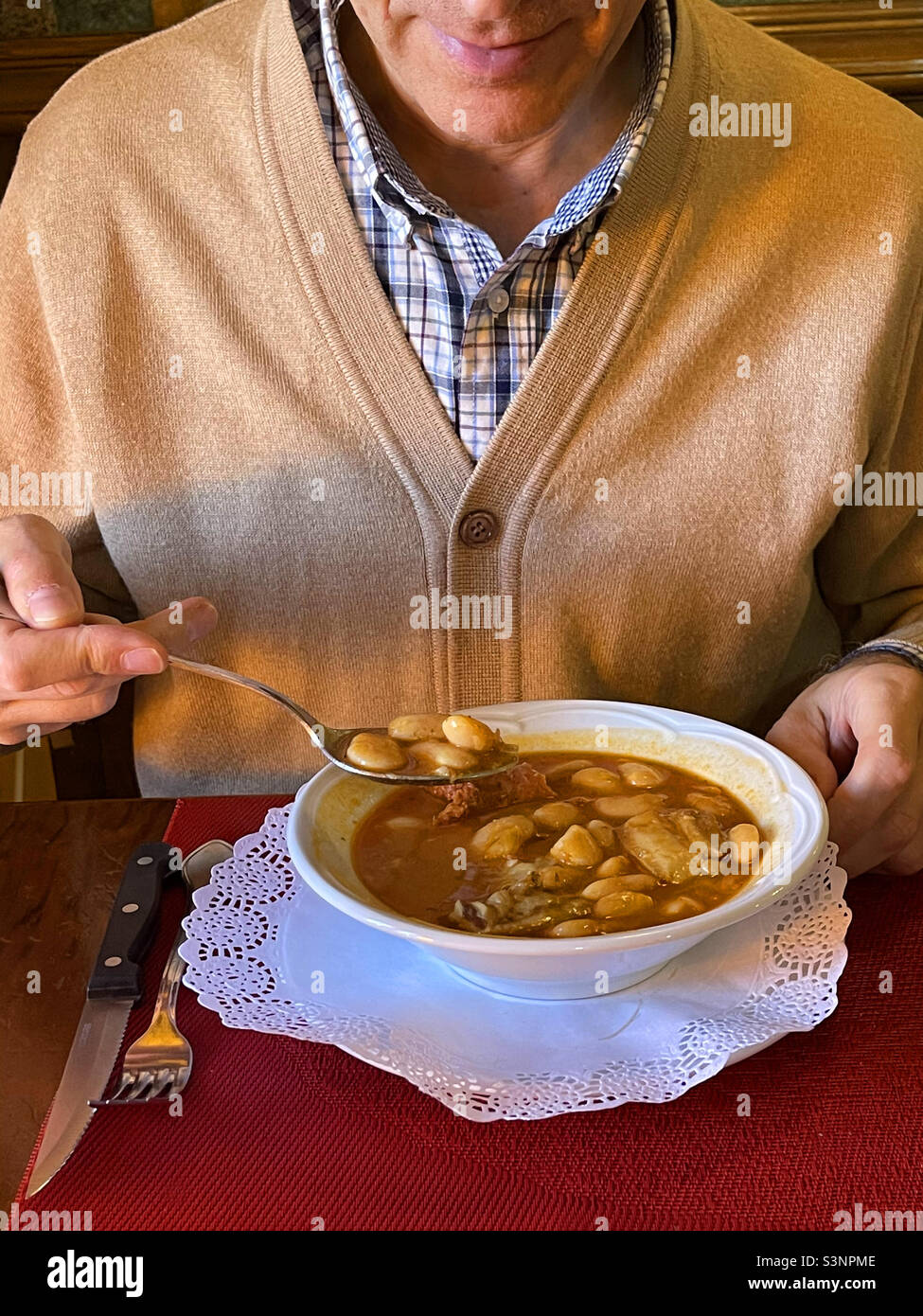 Man eating beans not woman hi-res stock photography and images - Alamy