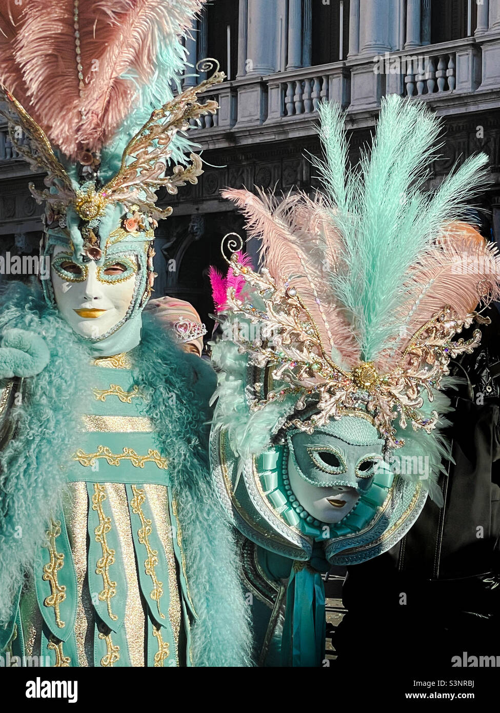 Elaborate costume with masks in Venice, Italy during the Carnevale, in ...