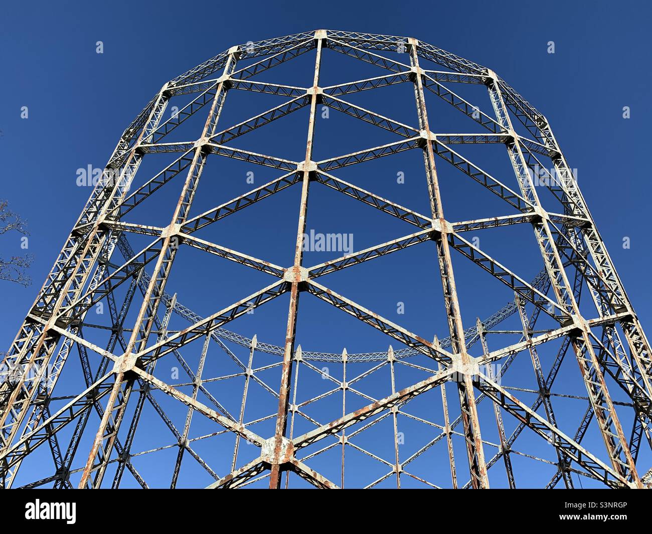 Old disused gas cylinder against blue sky Stock Photo - Alamy