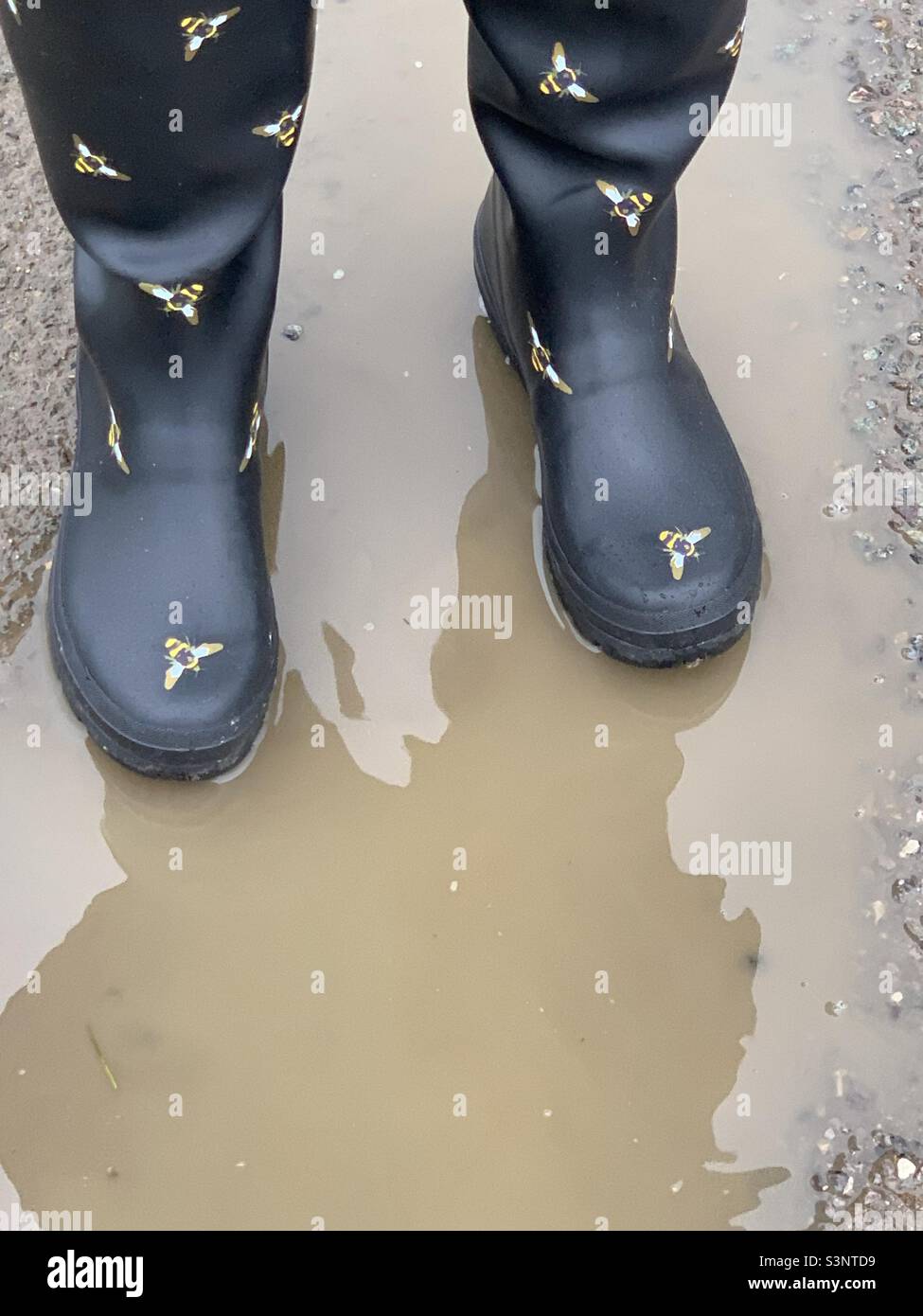 Wellies puddle hi-res stock photography and images - Alamy