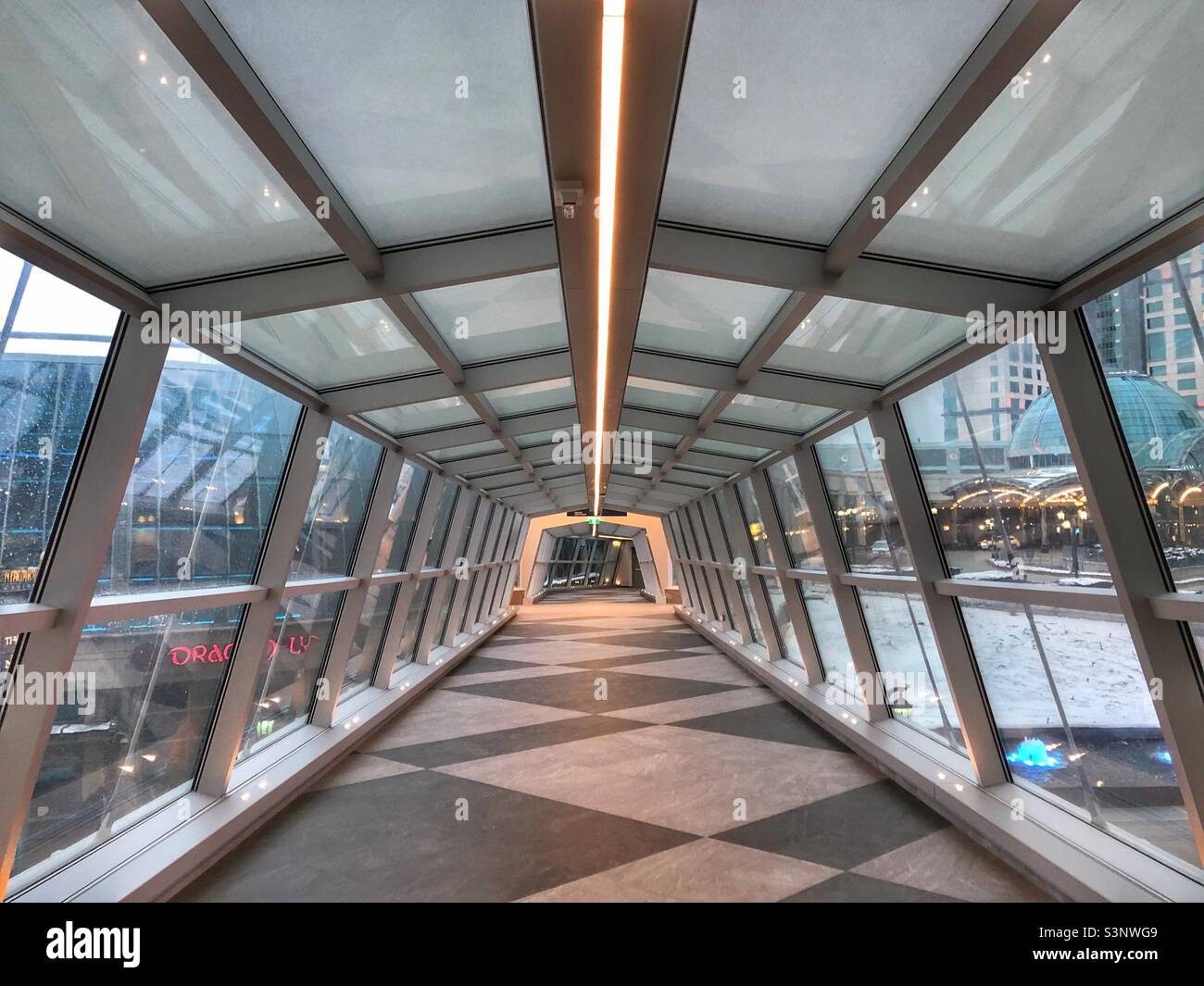 A deserted glass walkway between buildings in Niagara Falls, Canada ...