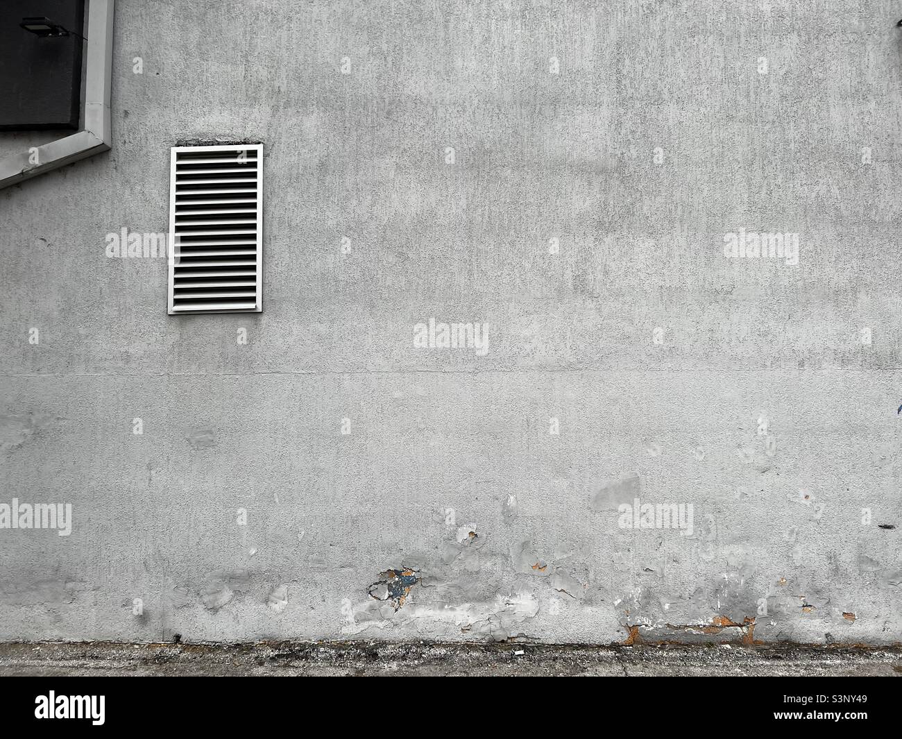 Gray industrial building wall as background Stock Photo - Alamy