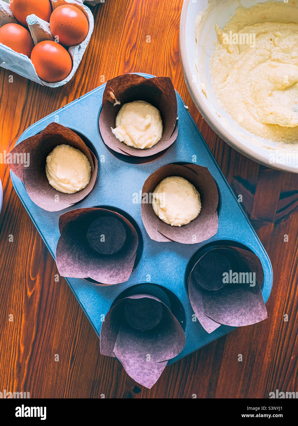 Gluten free orange fairy cakes. Not cooked Stock Photo - Alamy