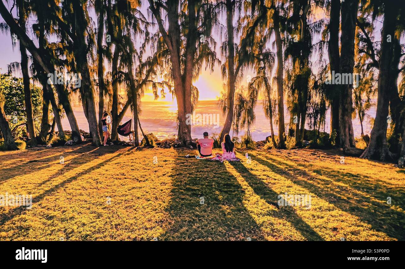 Stunning sunset silhouette landscape background with people watching ...