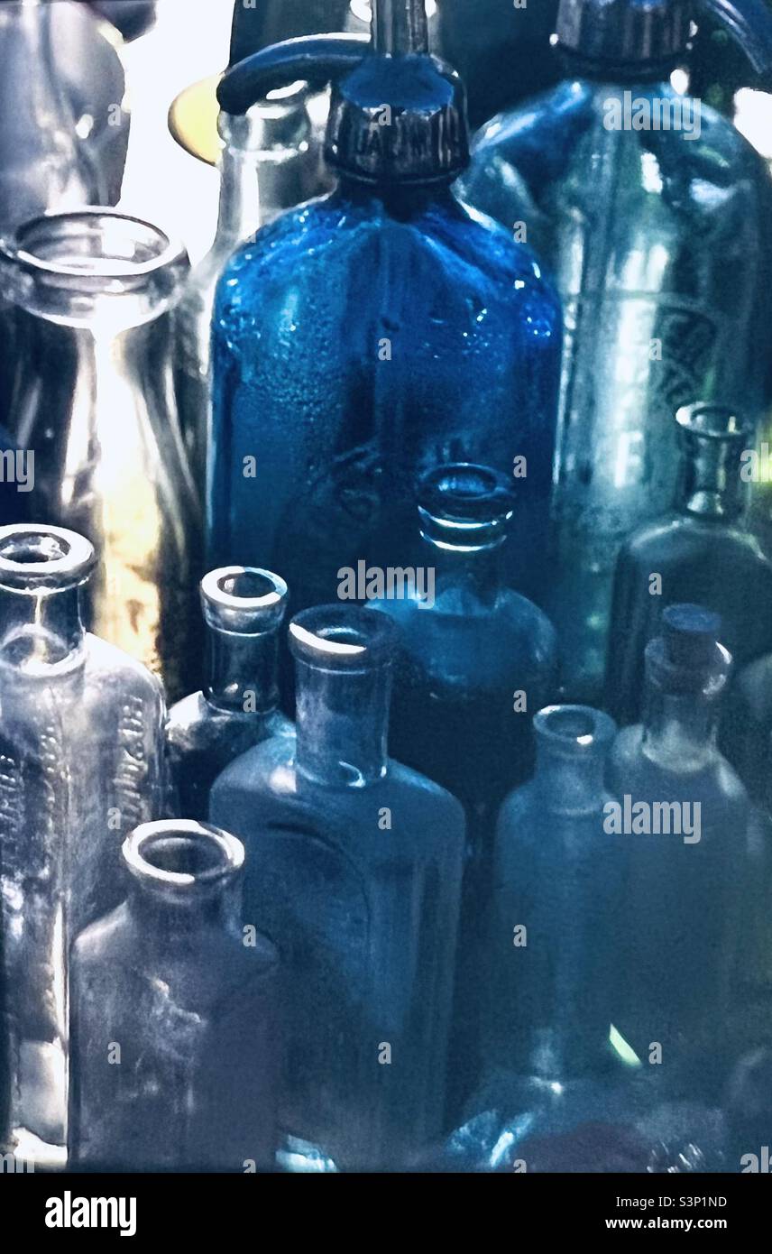 Collection of antique blue glass bottles Stock Photo - Alamy