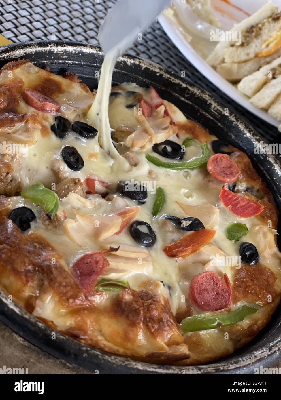 Pizza with lots of cheese Stock Photo - Alamy