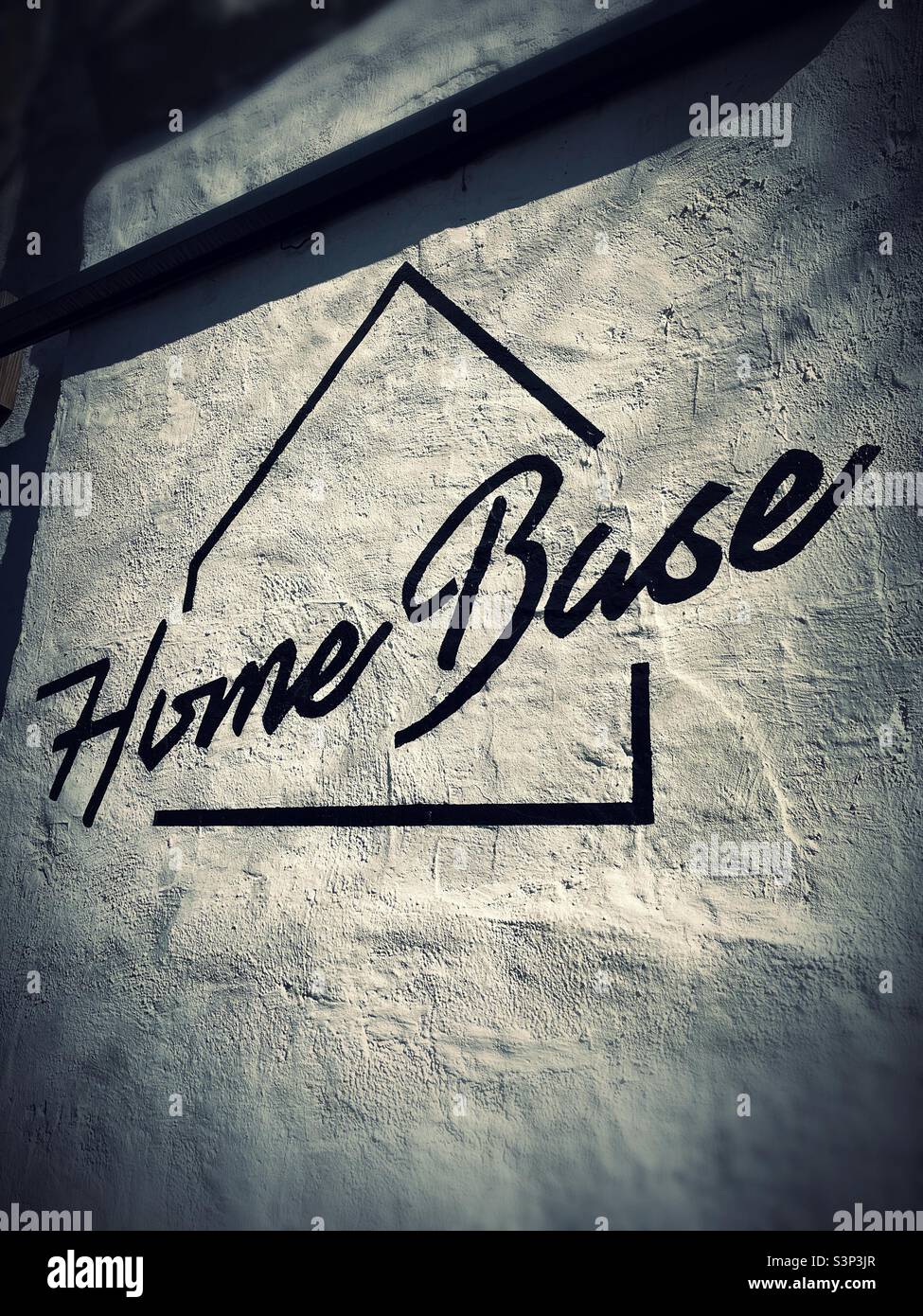 A home base sign on a wall in New York City Stock Photo - Alamy