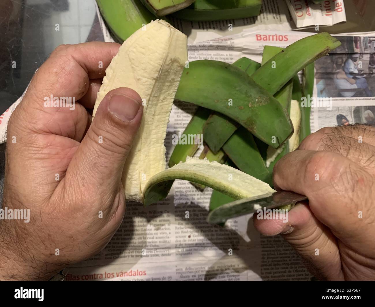 Peeling off a plantain hi-res stock photography and images - Alamy