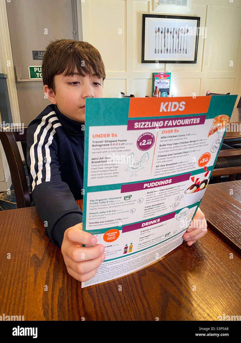 Menu browsing hi-res stock photography and images - Alamy