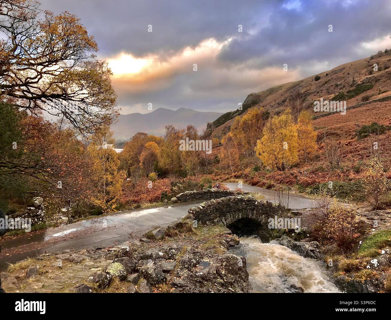 Stone bridge over river in autumn, Lake District Stock Photo - Alamy