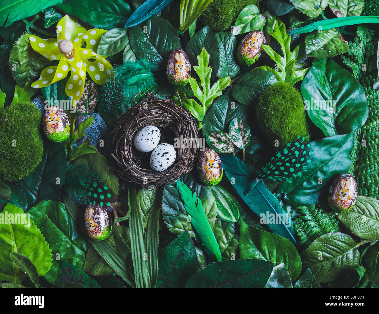 Easter themed flat lay in shades of green, with birds nest and Easter ...