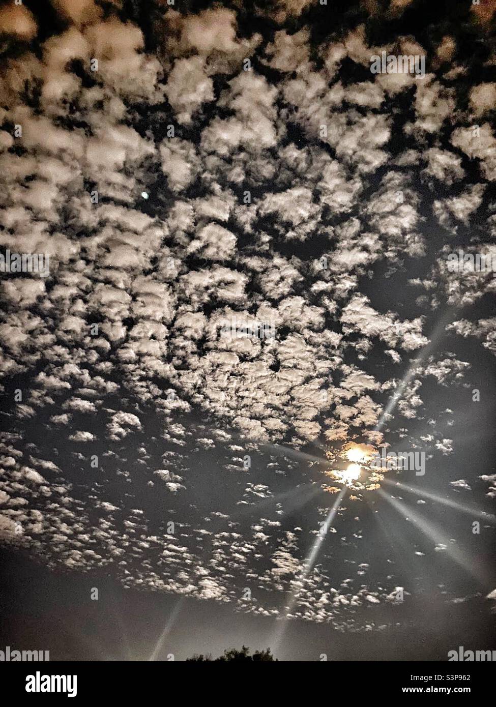 Full moon rays and clouds Stock Photo - Alamy