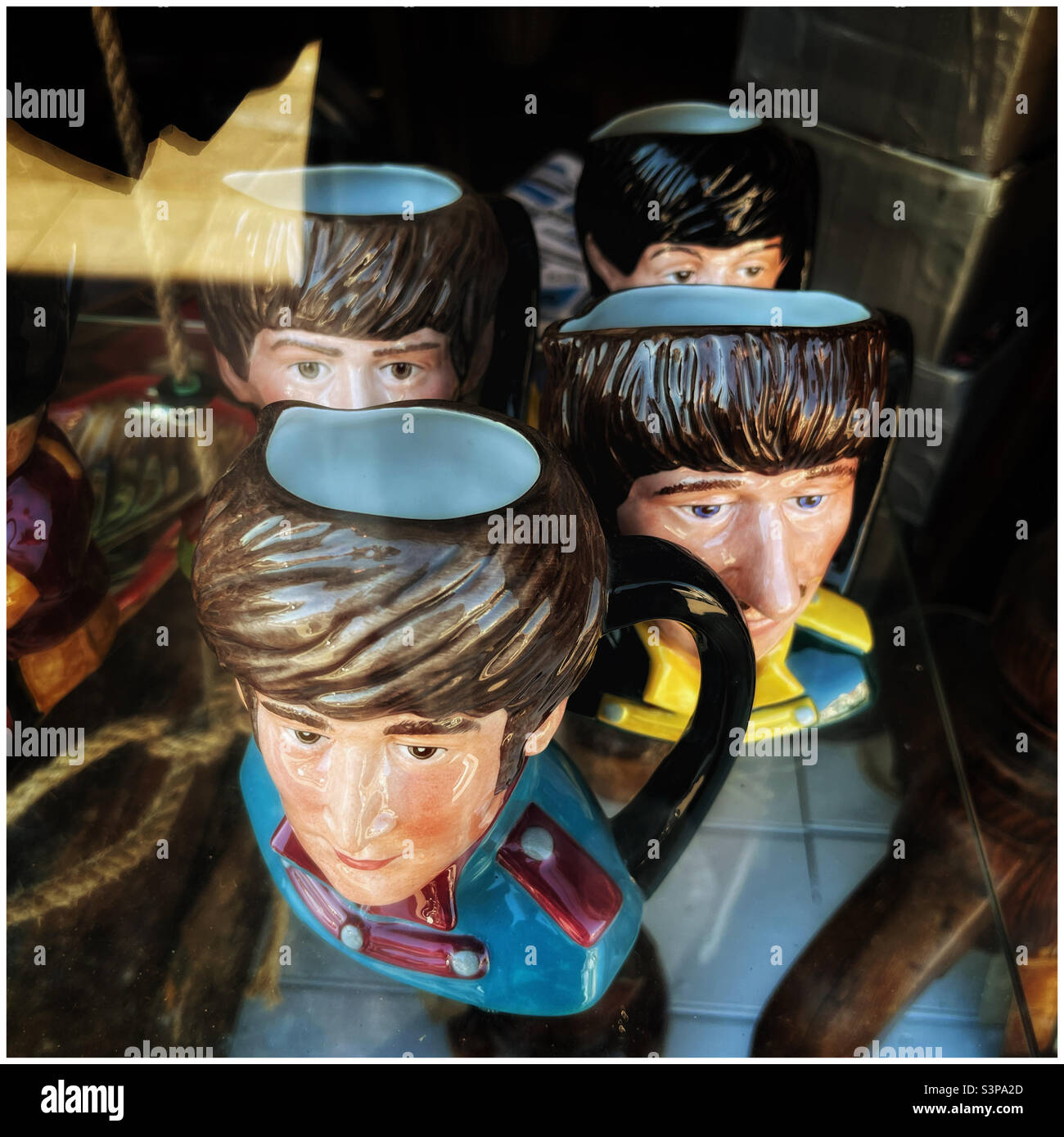 The Beatles as Toby jugs on display in shop window Stock Photo - Alamy