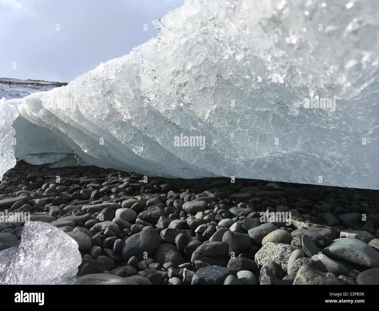 Pebbles and snow hi-res stock photography and images - Alamy