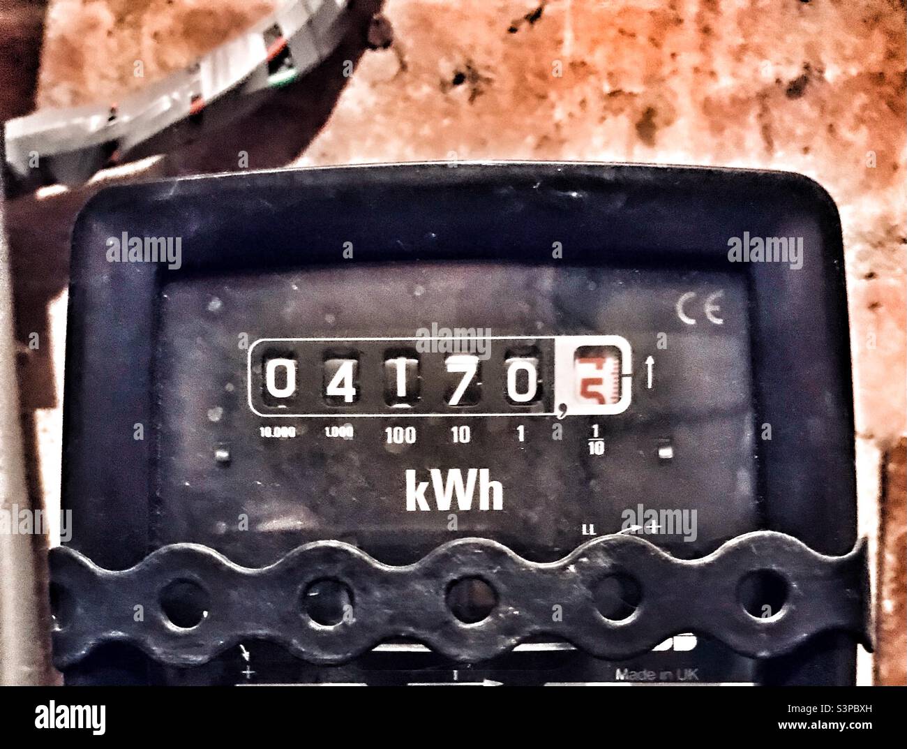Old school vintage electricity meter Stock Photo - Alamy