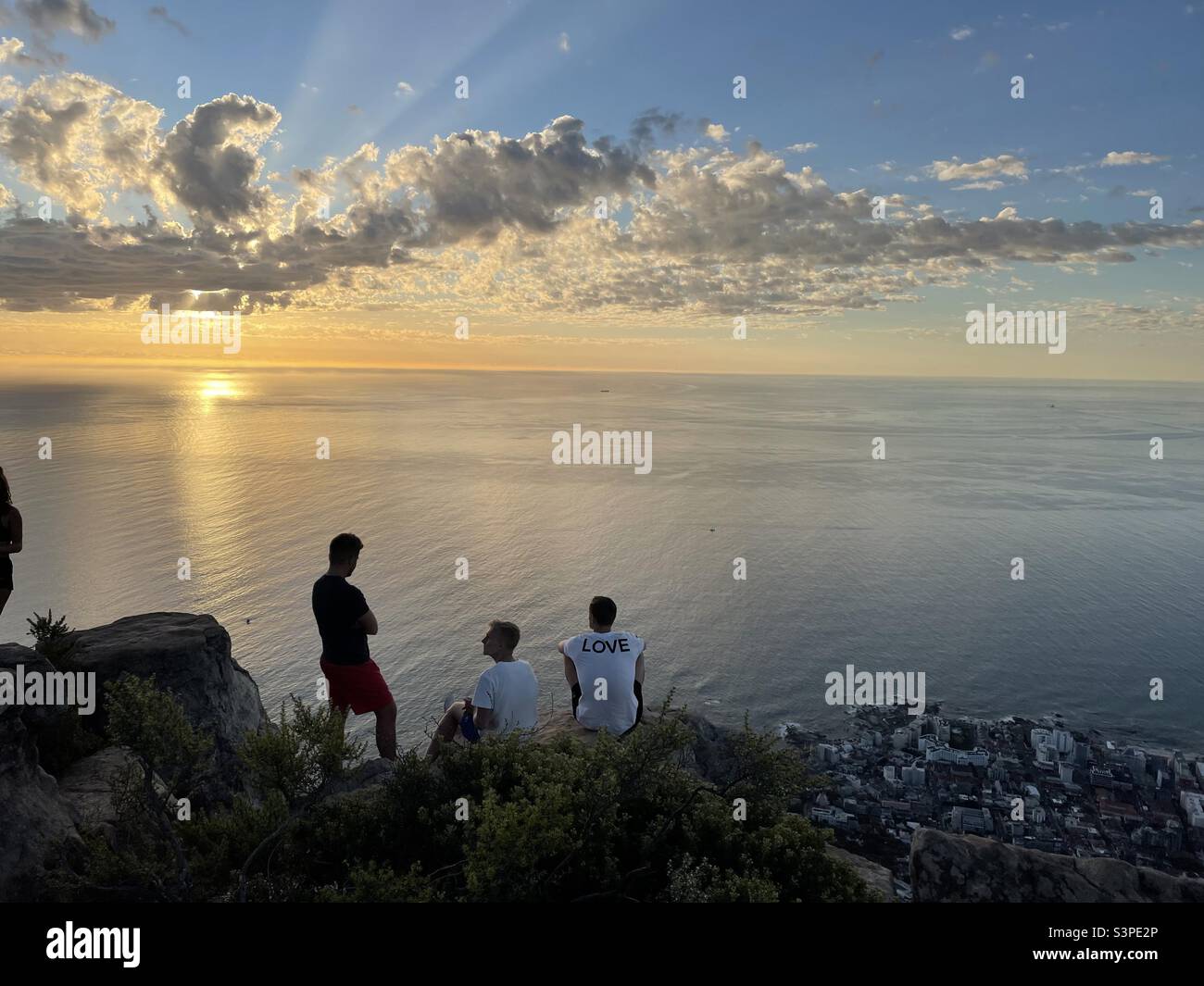Watching sunset over sea hi-res stock photography and images - Alamy