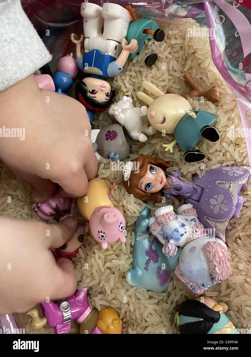 Toys in rice hi-res stock photography and images - Alamy