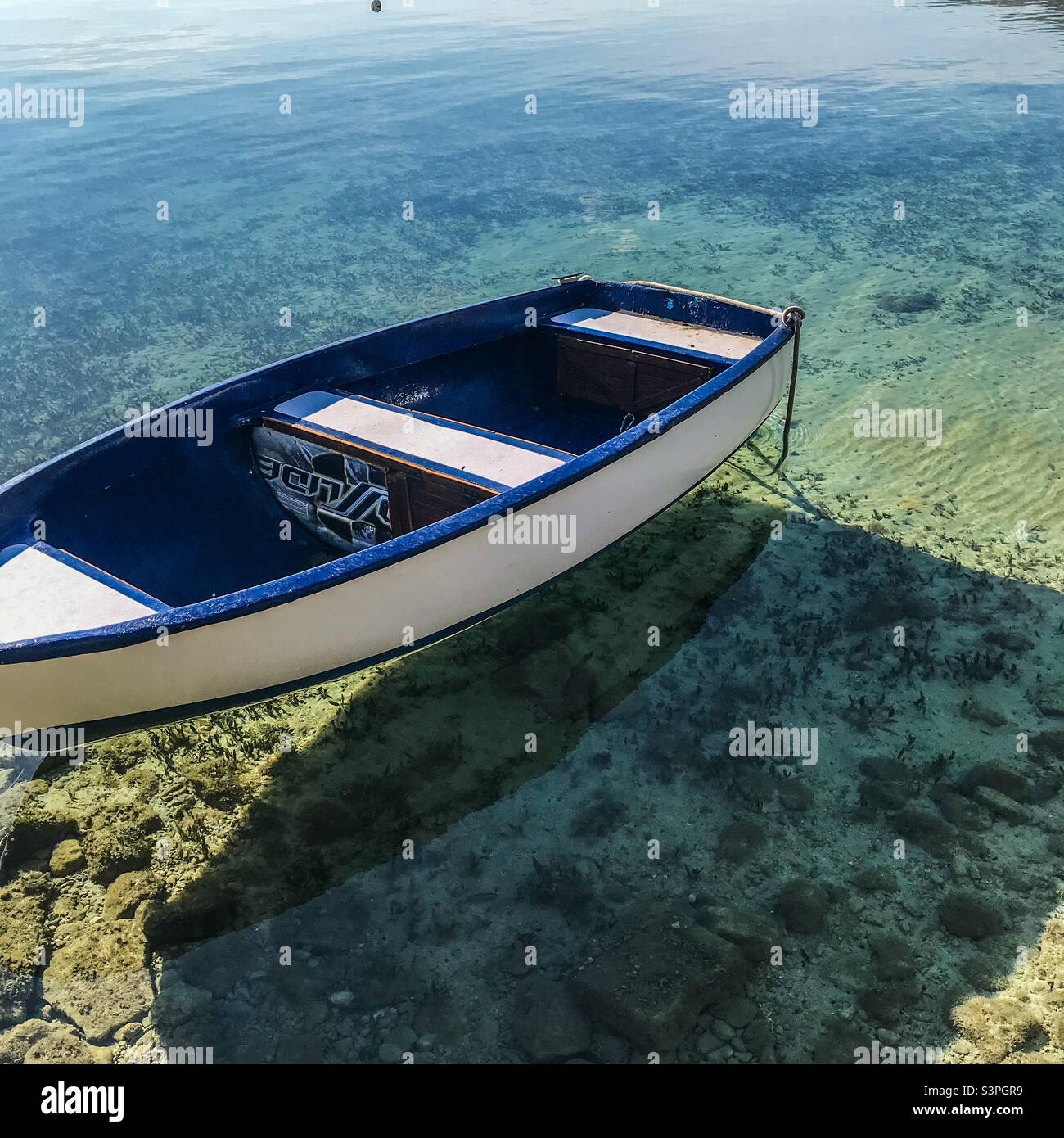 Floating boat clear water hi-res stock photography and images - Alamy