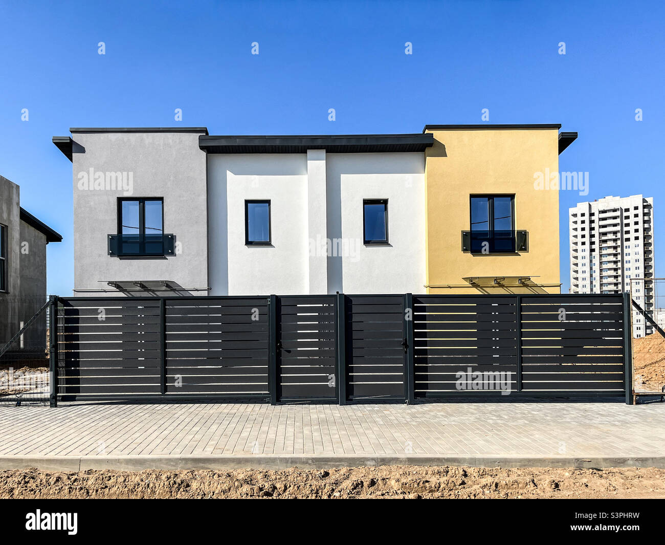 Exterior view of a modern townhouse. The concept of outdoor buildings ...