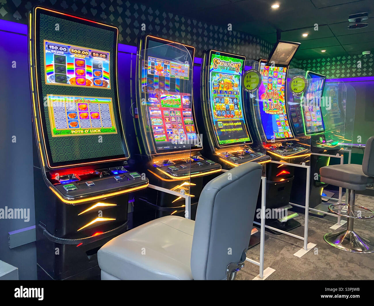 Fruit machines at a motorway service station offer people the chance to ...