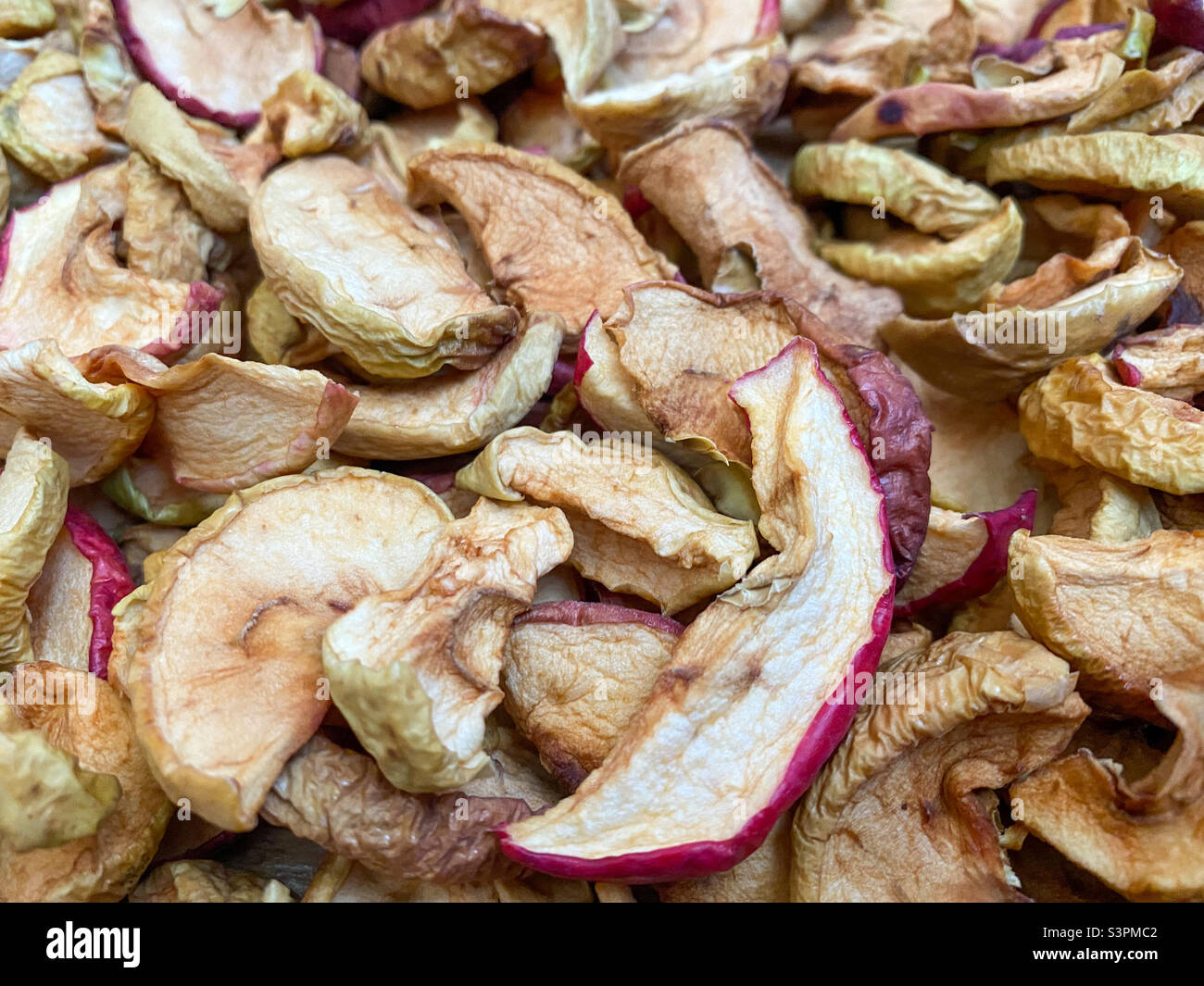 Background of dried apples in close-up. Texture of dried apples Stock ...