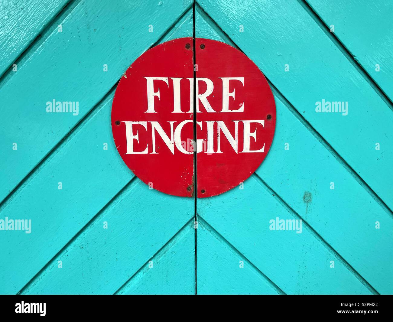 Fire Engine sign on a turquoise wooden door at Portmeirion, Gwynedd ...