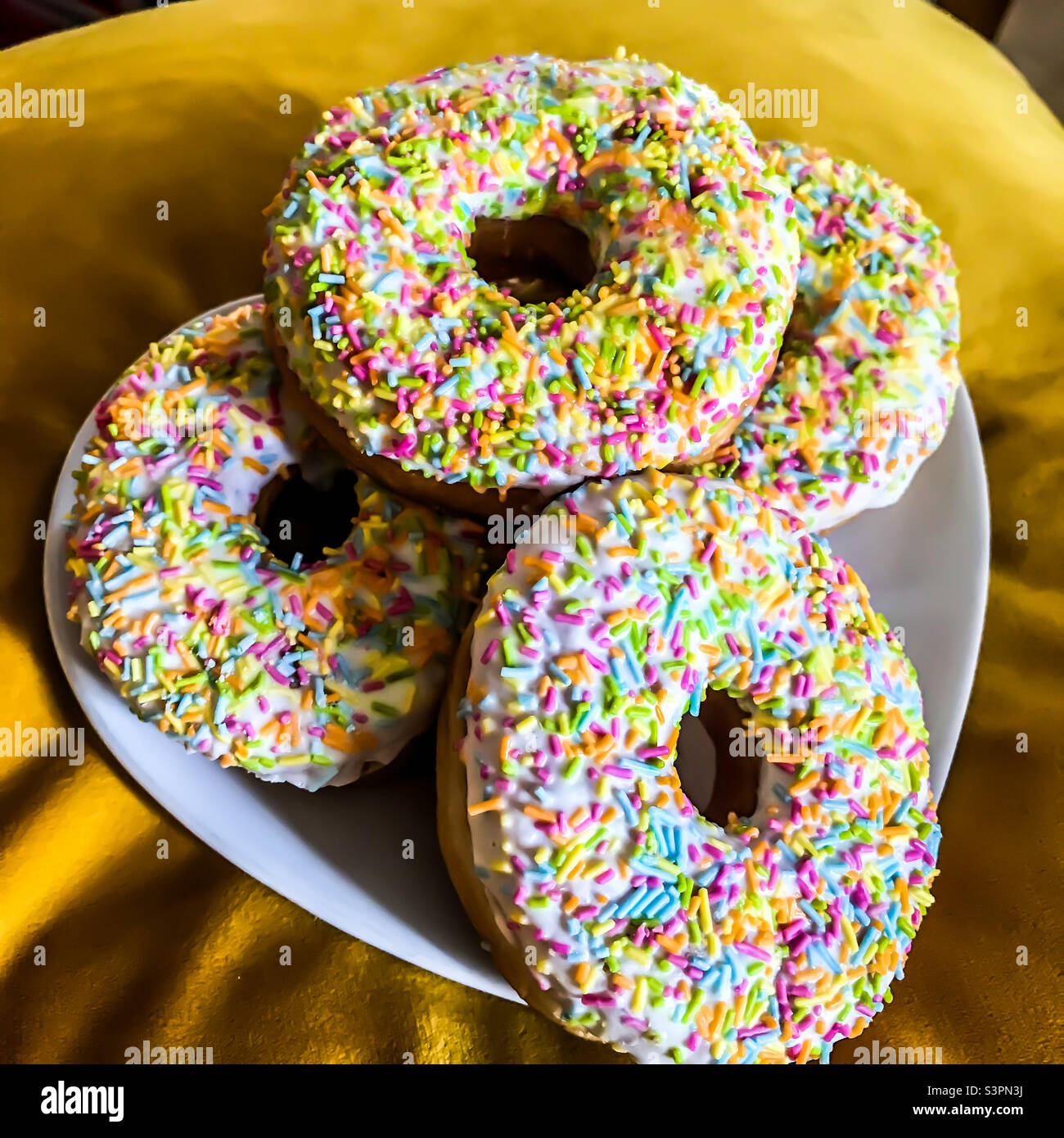 Hundreds and thousands donuts Stock Photo - Alamy