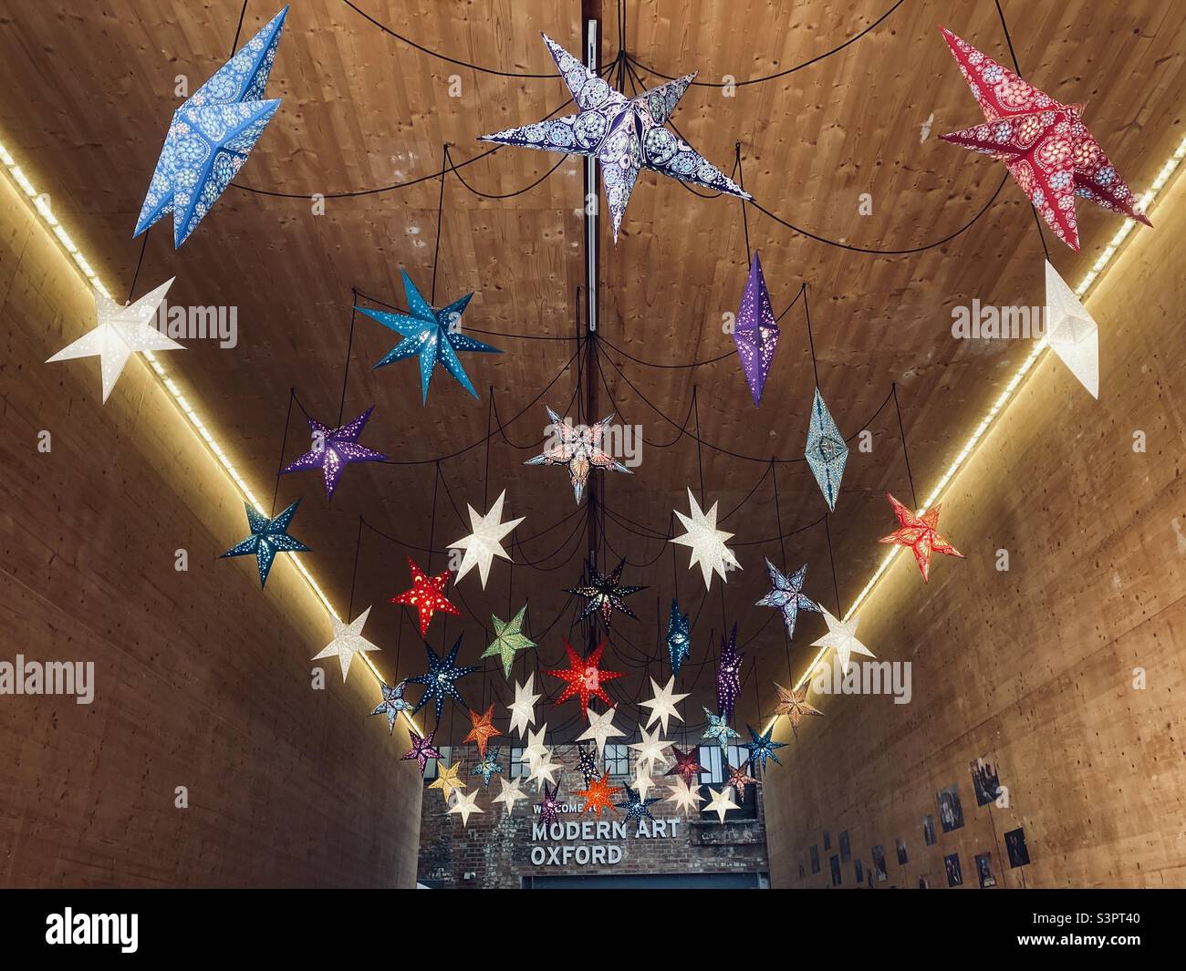 Modern Art Oxford. Hanging colourful stars installation Stock Photo - Alamy