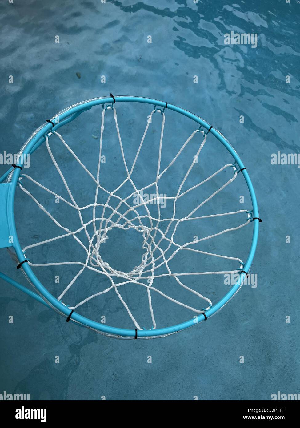 Baseball net over swimming pool water Stock Photo - Alamy