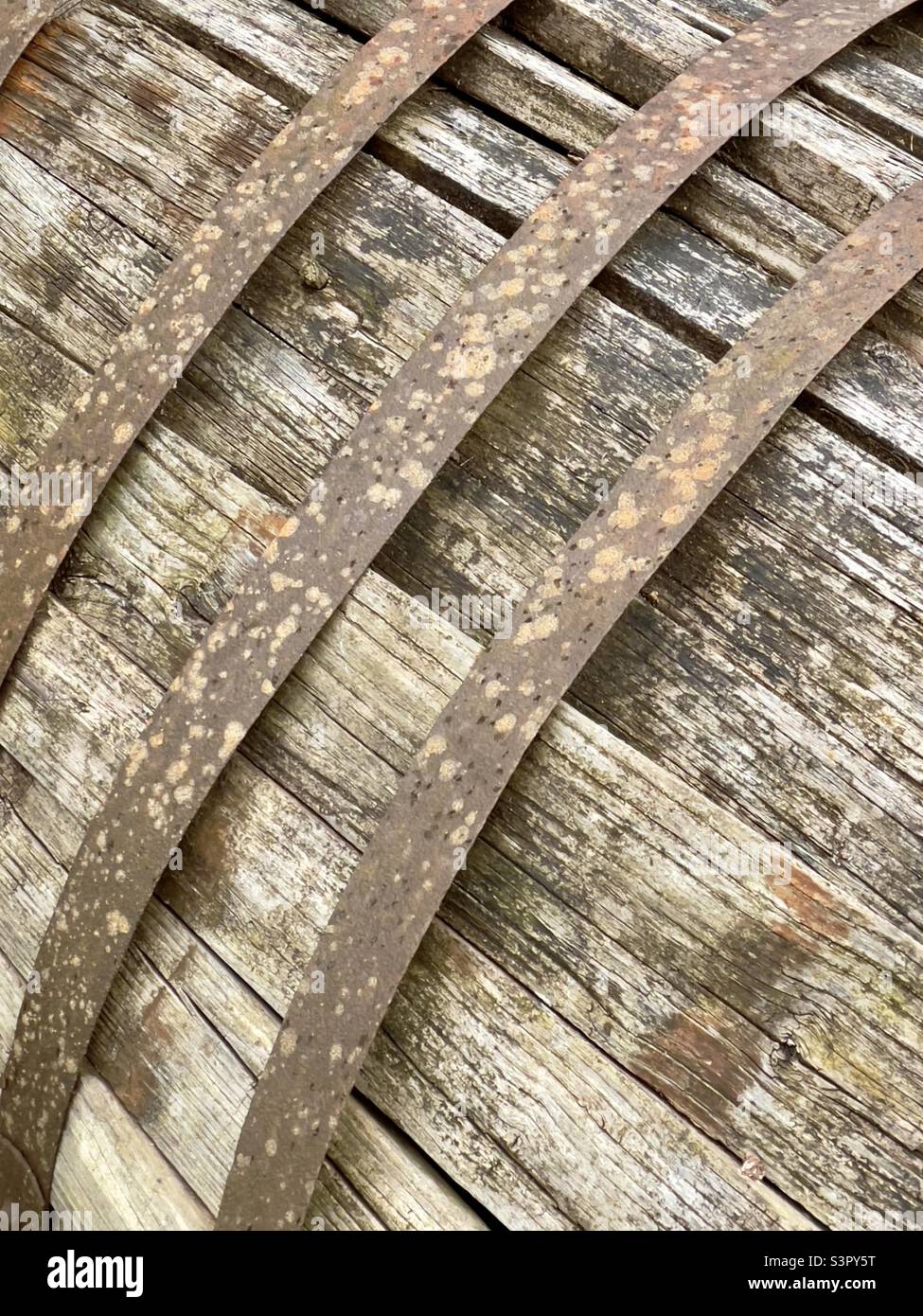 The loose hoops and staves of a damaged old barrel, falling apart Stock ...