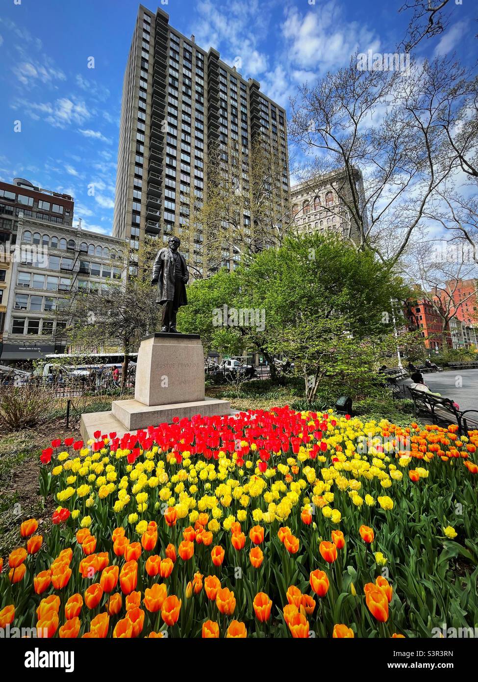 The Roscoe Conklin statue in Madison Square, Park is surrounded by a ...