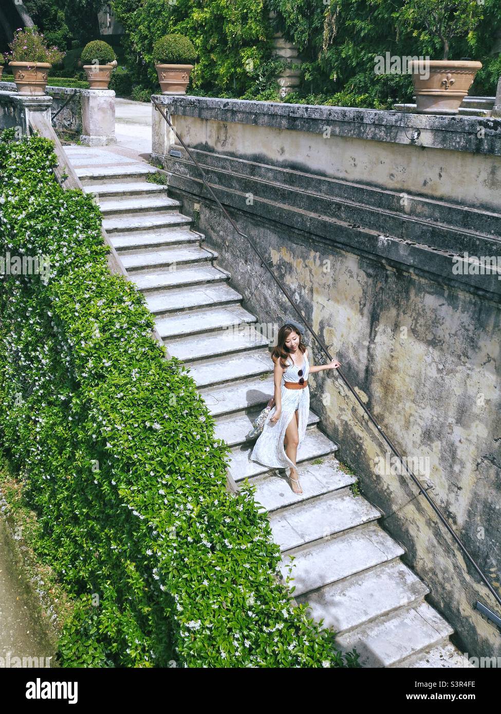 Adult and walking and down stairs hi-res stock photography and images ...