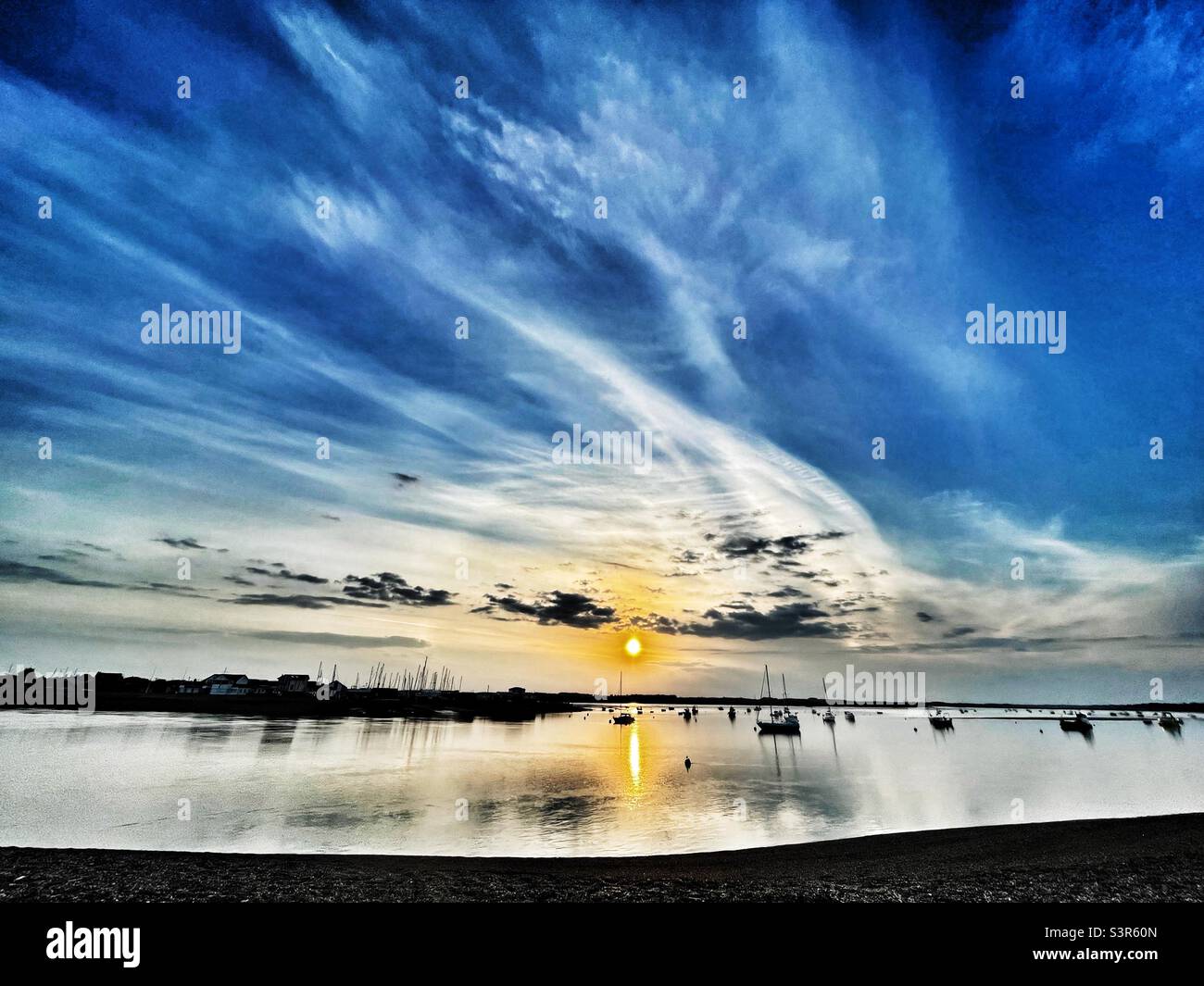 Sunset over the river Deben Felixstowe Ferry Suffolk Stock Photo - Alamy