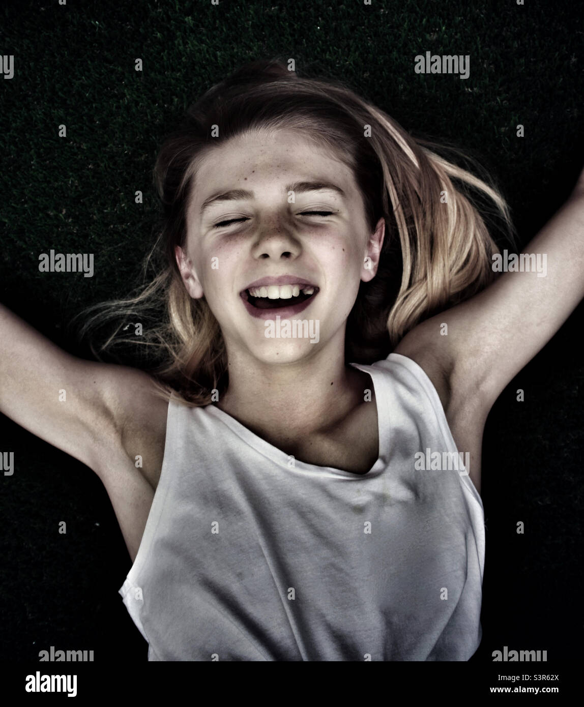 Portrait of laughing girl Stock Photo - Alamy