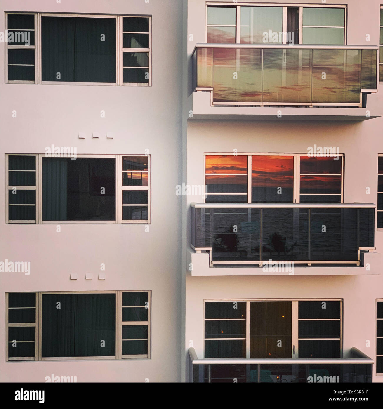 Sunrise reflected in windows, Miami Beach, Florida, United States Stock ...