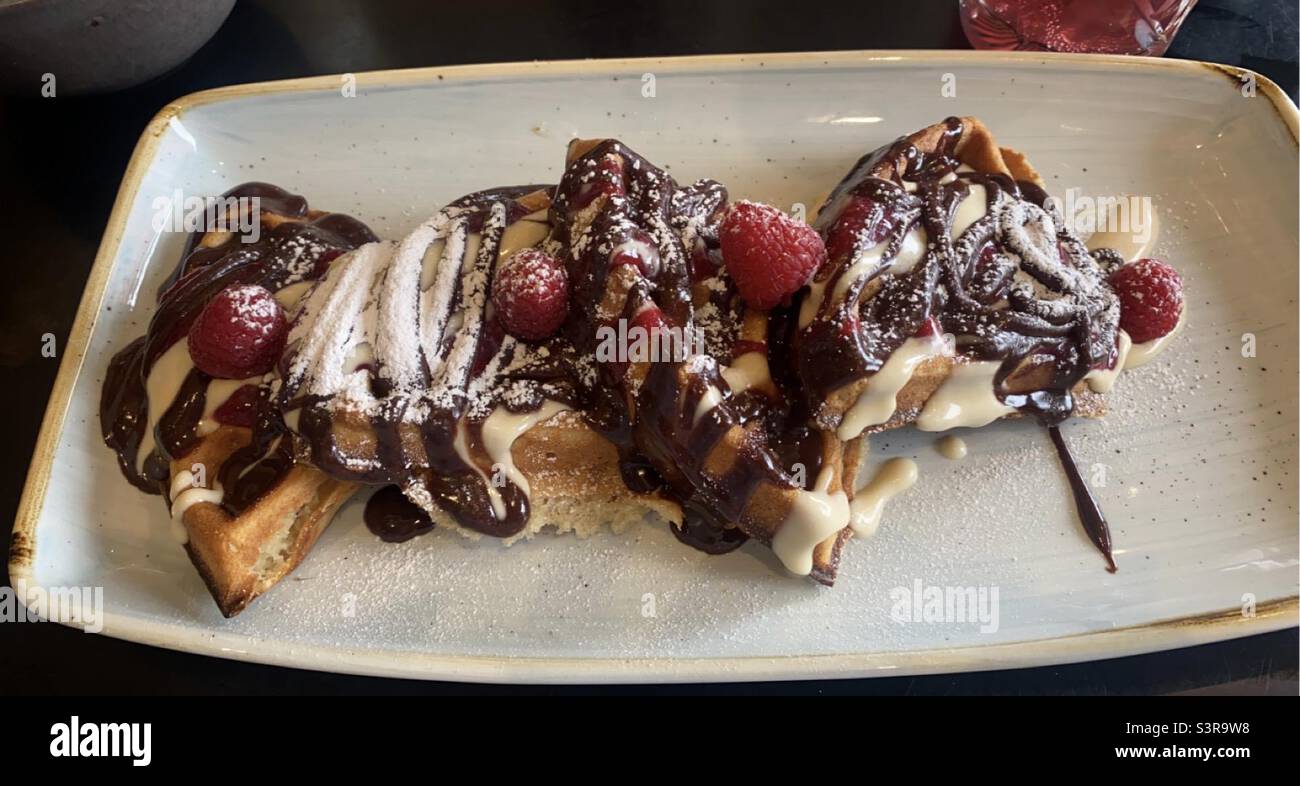 Waffles with raspberry & Nutella - Mimi’s Bakehouse Stock Photo - Alamy