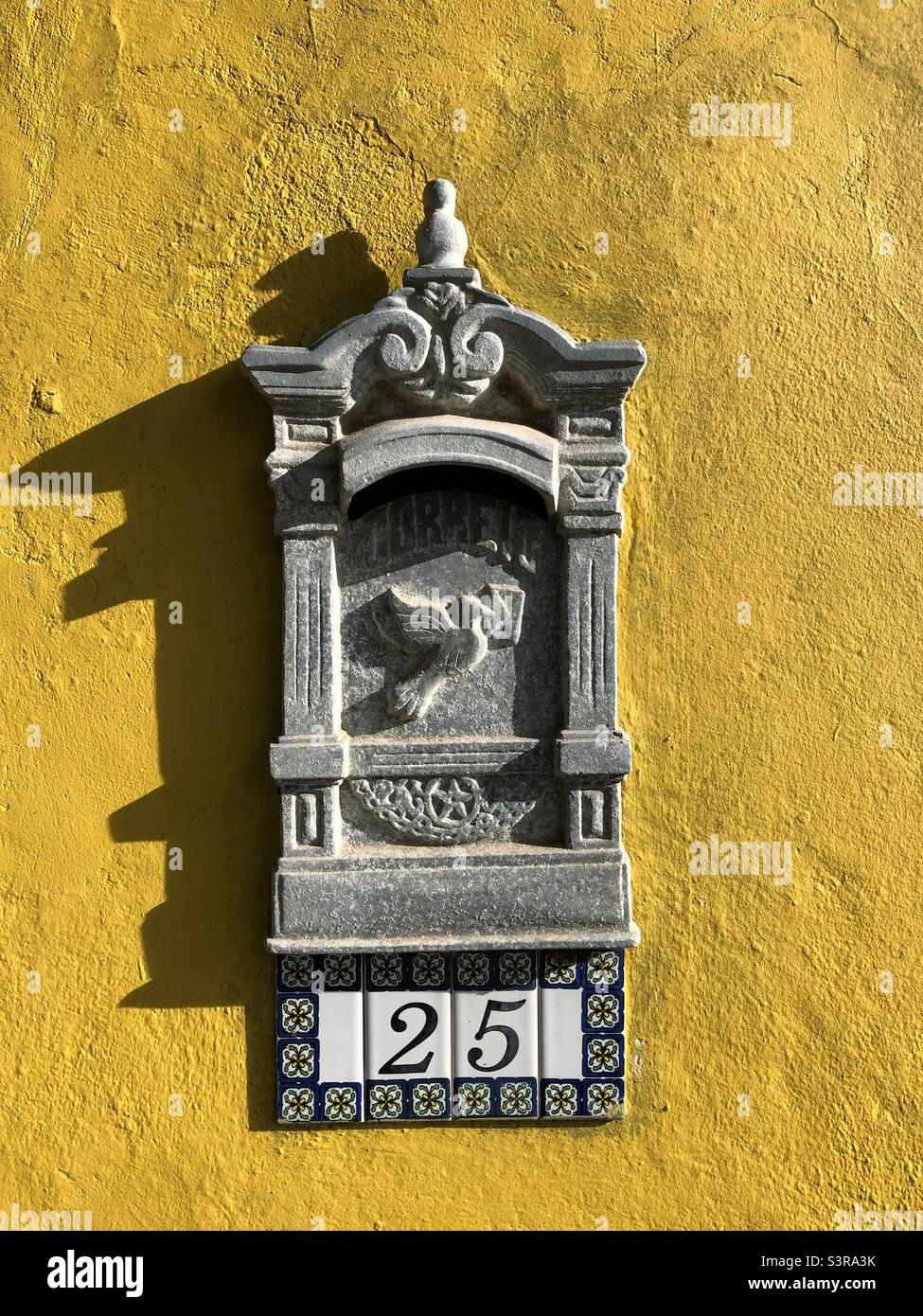 A carved stone house number Stock Photo - Alamy