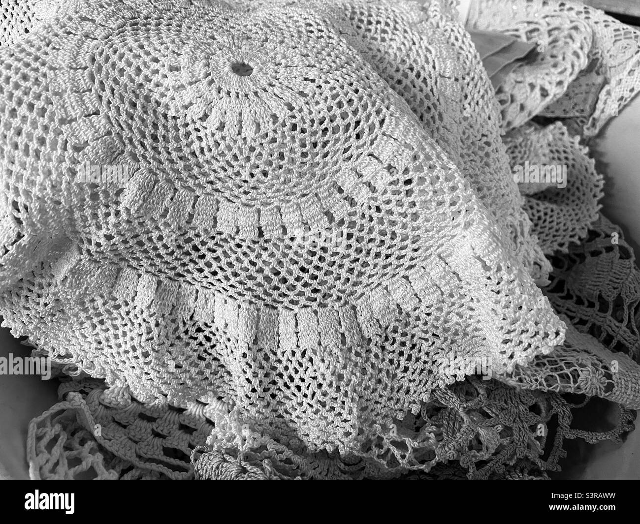 Stack of antique lace doilies Stock Photo - Alamy