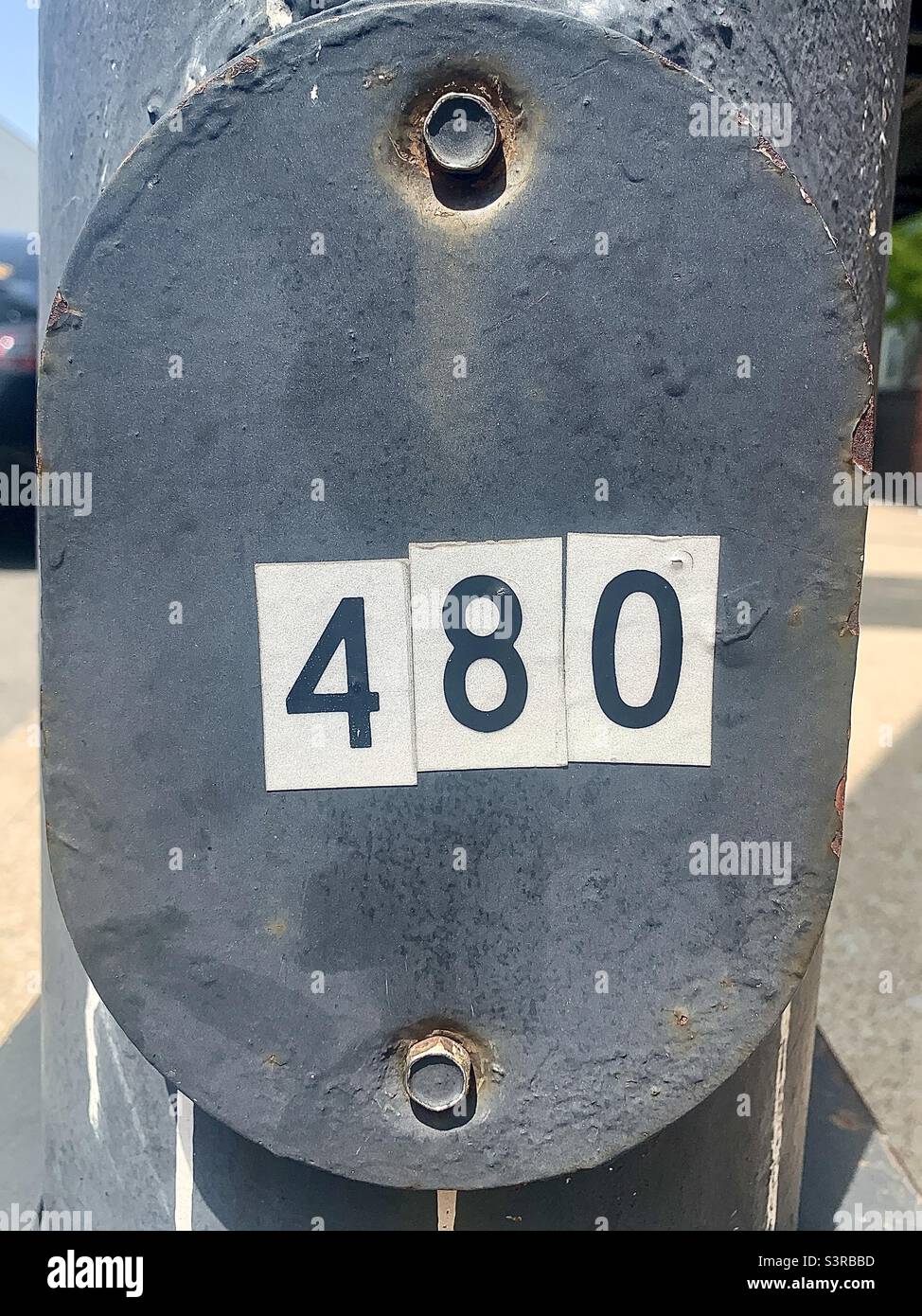 Gray Metal Contraption with Numbers 480 Stock Photo - Alamy