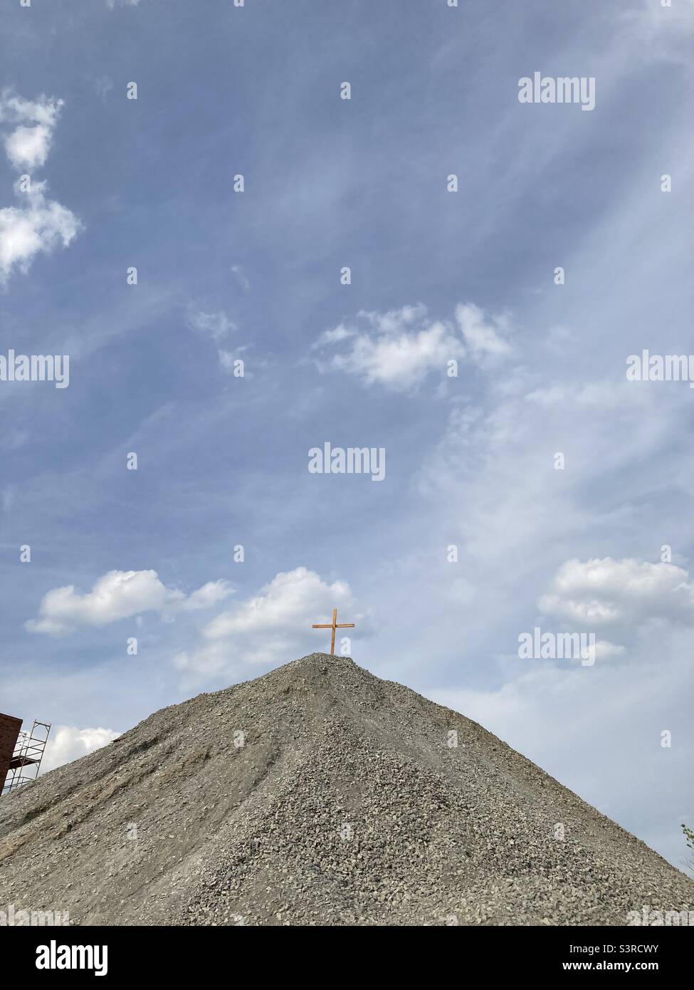 A Wooden Cross on a heap of gravel on a construction Site Stock Photo ...