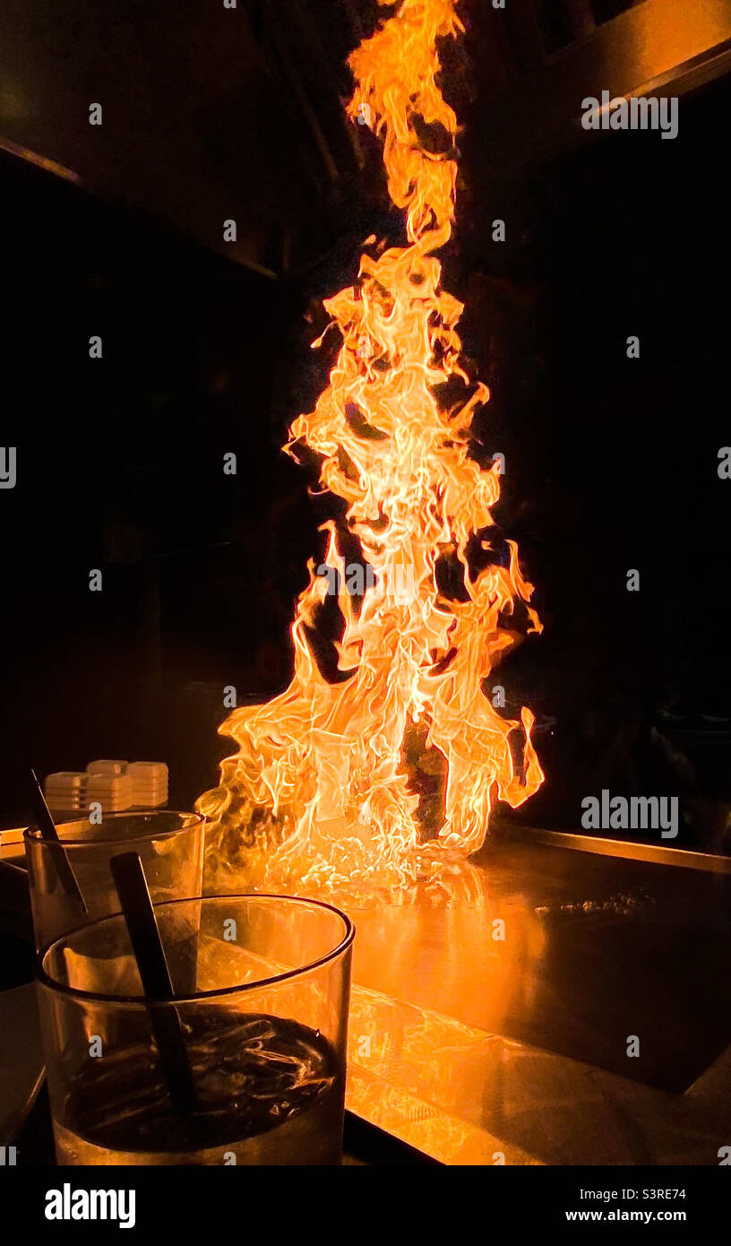 Display of fire at a teppanyaki restaurant Stock Photo - Alamy