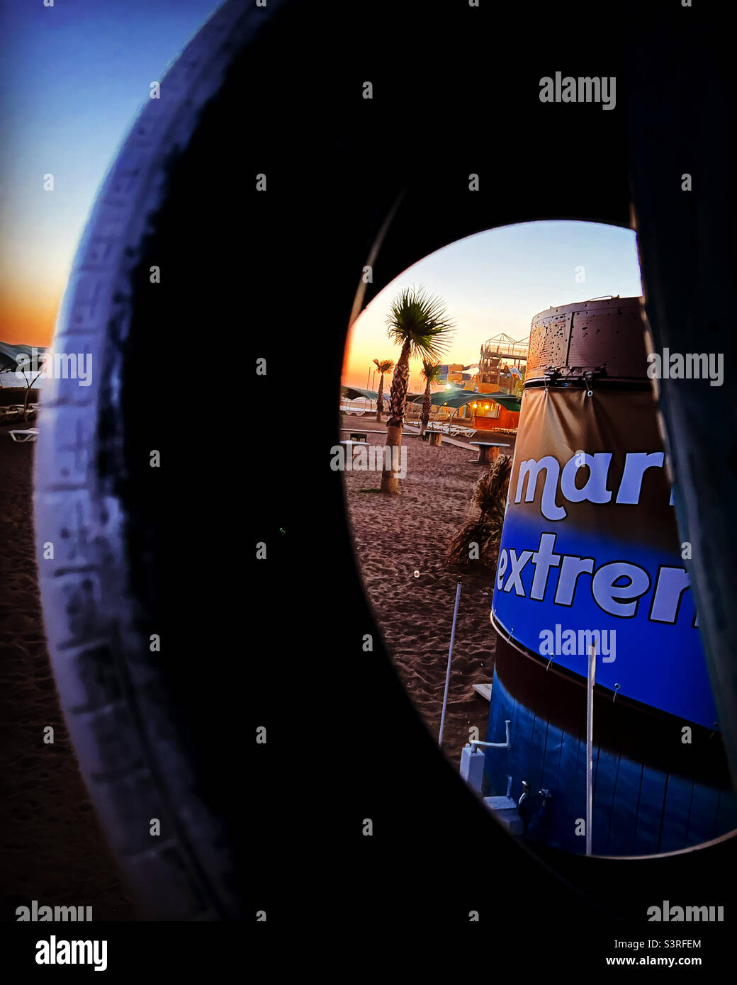 View through the eye of the tyre Stock Photo - Alamy