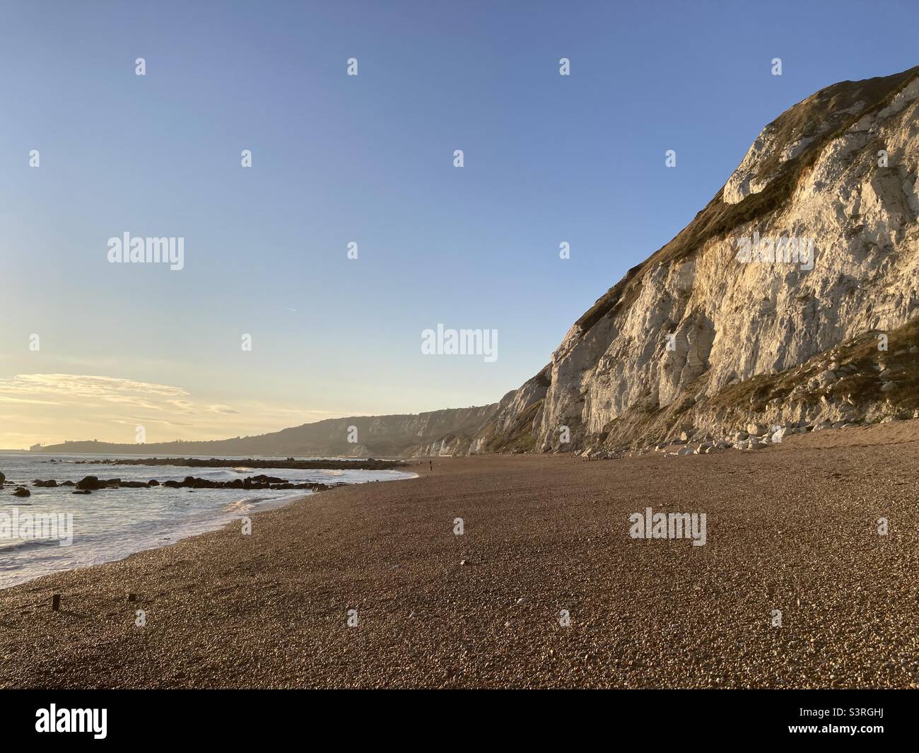 Beach under the cliffs Stock Photo - Alamy