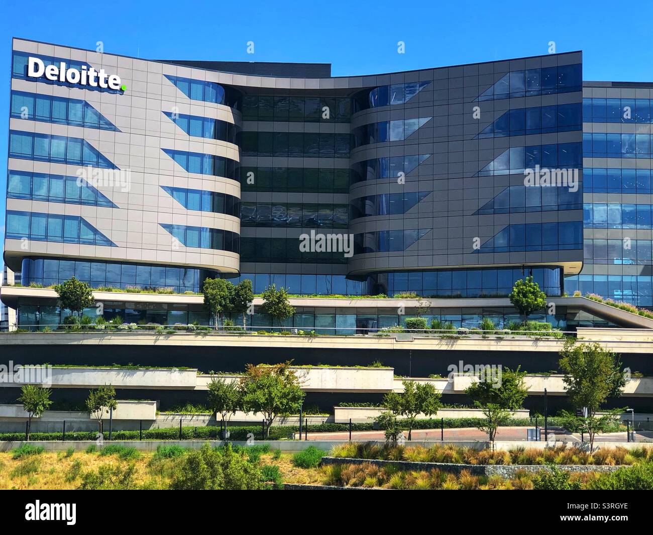 Deloitte office smartphone stock photos and images - Alamy