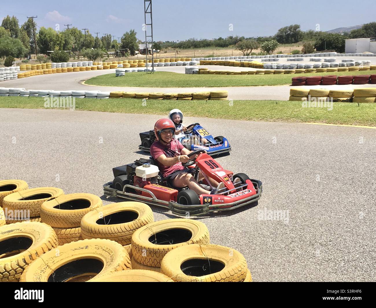 Race karts on a track Stock Photo - Alamy