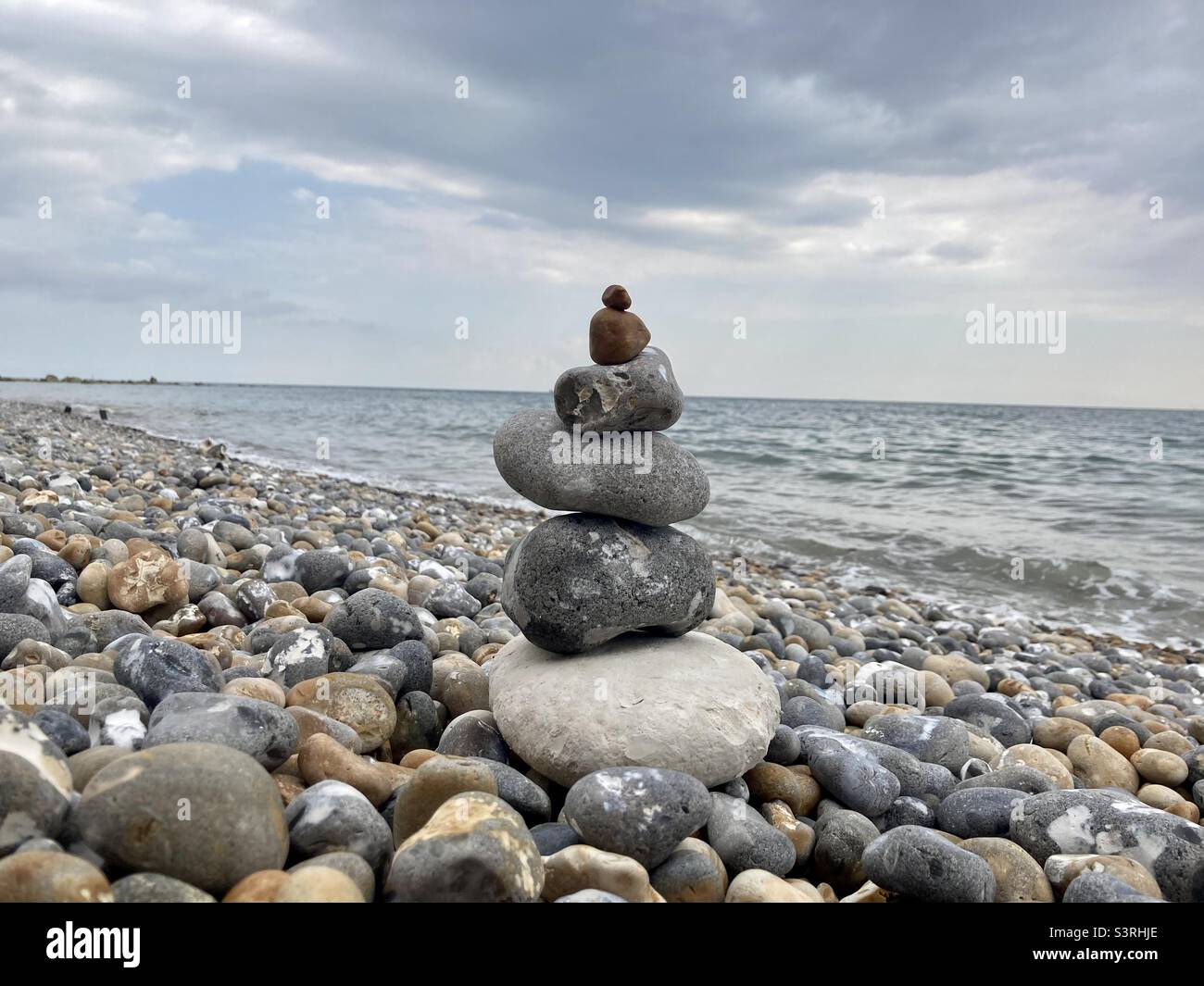 Stack of pebbles on a beach Stock Photo - Alamy