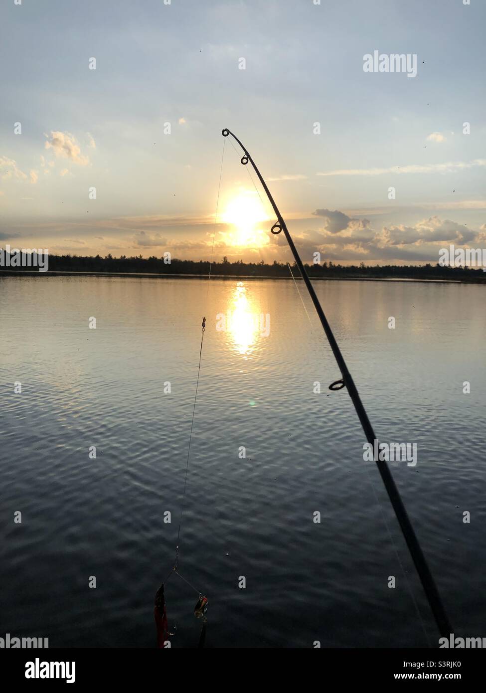 Fishing with the Morning Sunrise Stock Photo - Alamy